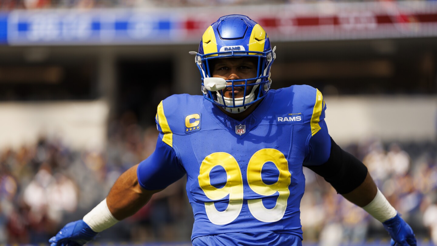 Dan Campbell: Rams' Young Talent Shines Without Aaron Donald
